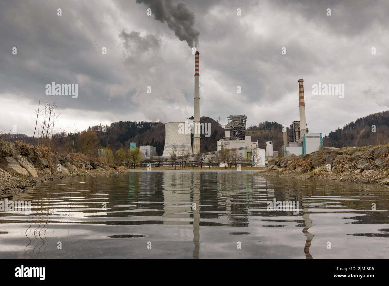 Thermal power plant smoke polluting air and environment Stock Photo - Alamy