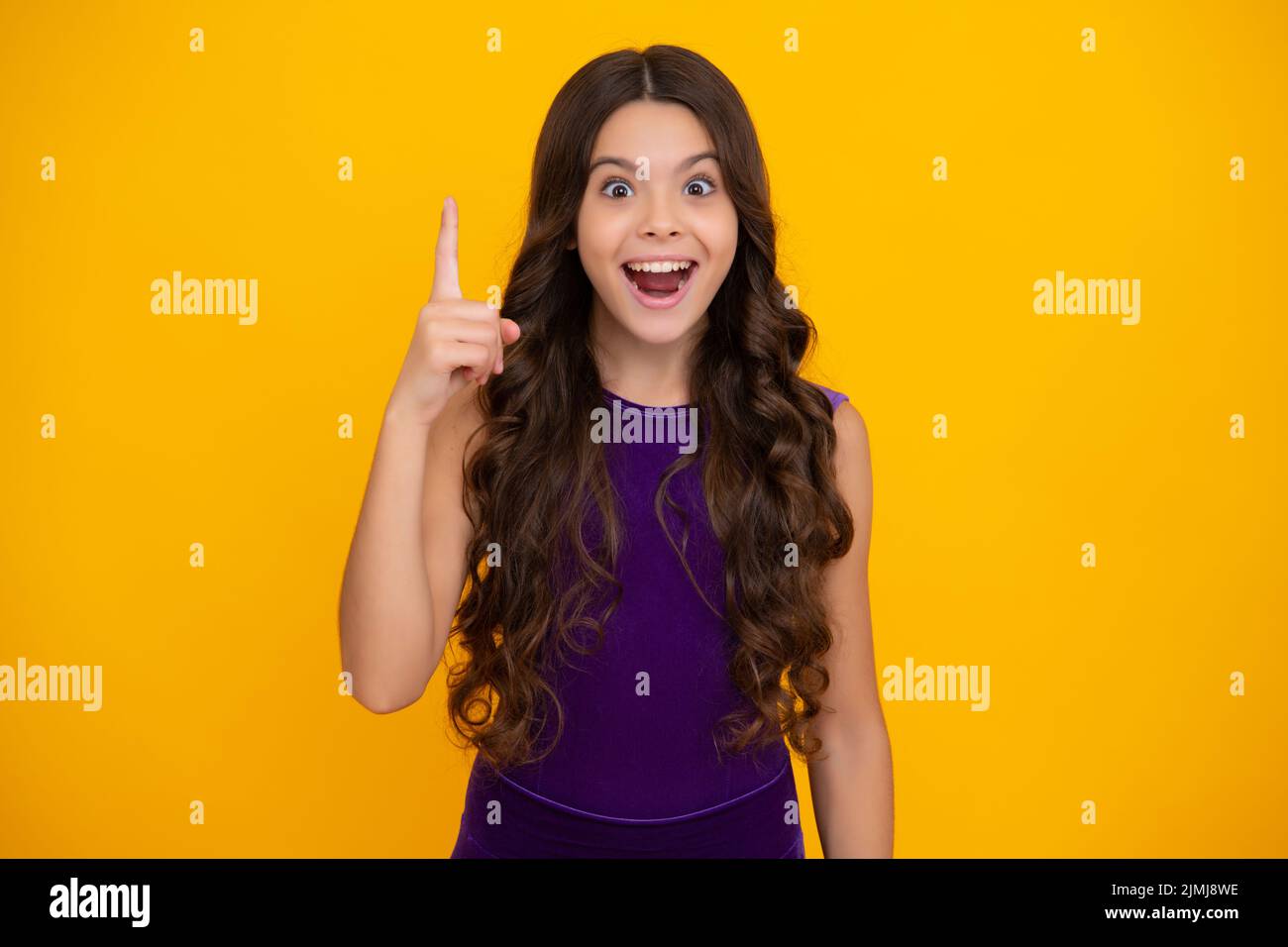 Confident and successful young teenager child over isolated yellow ...