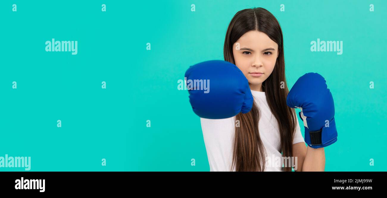 knockout. power and authority. teen girl in sportswear boxing gloves ...