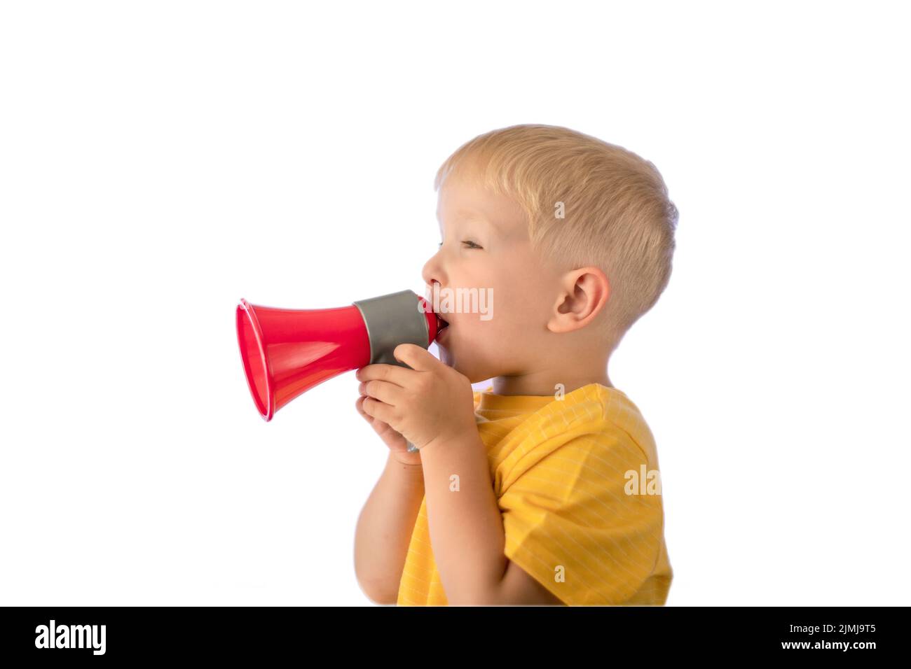 Cute little boy with megaphone on white background Stock Photo - Alamy