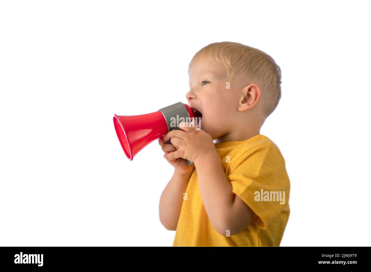 Cute little boy with megaphone on white background Stock Photo - Alamy