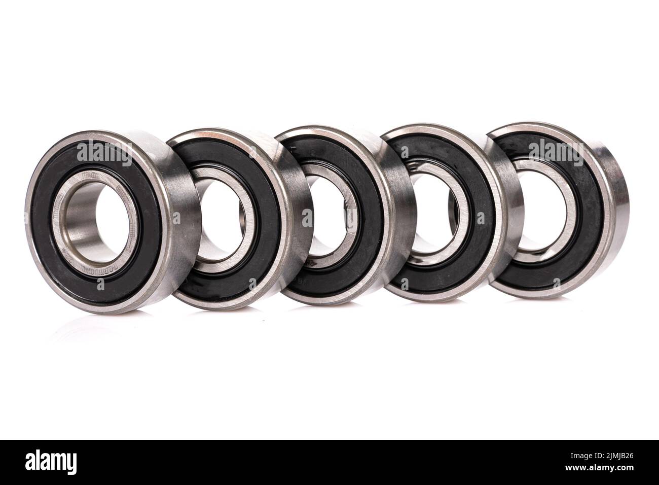 A row of high tech bearings on a white background Stock Photo - Alamy