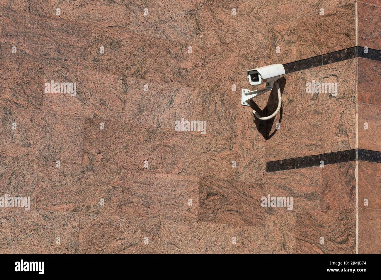 White CCTV surveillance security camera video equipment in tower home ...