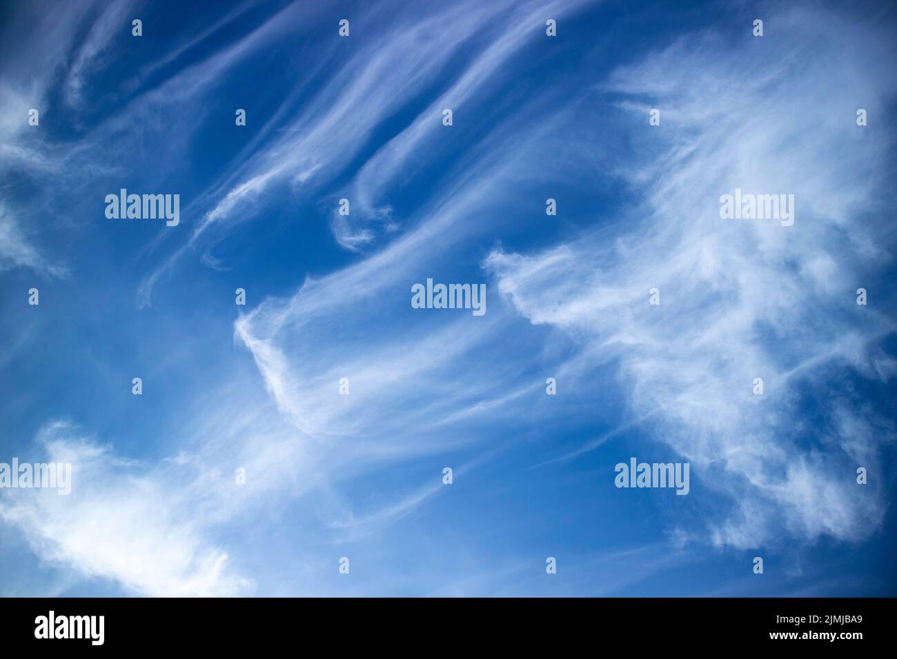 Layers of white clouds in blue sky Stock Photo - Alamy