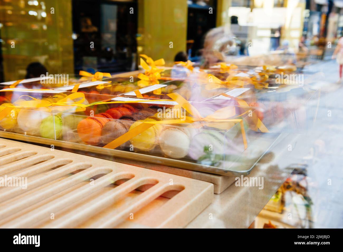 Side view of delicious French macarons for sale at French pastries shop ...
