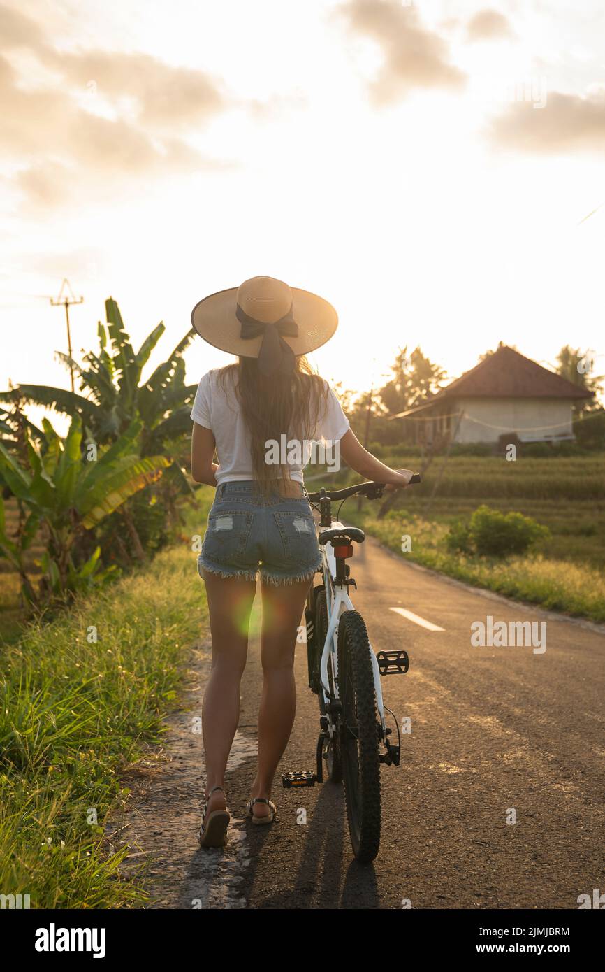 Walking by a bicycle hi-res stock photography and images - Alamy