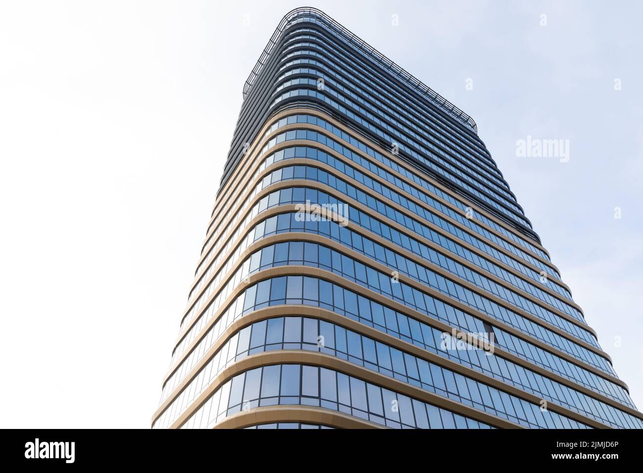 Tall modern office building, bottom view Stock Photo - Alamy