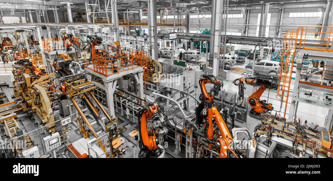 Panoramic Photo. Automobile production line. Welding car body. Modern ...