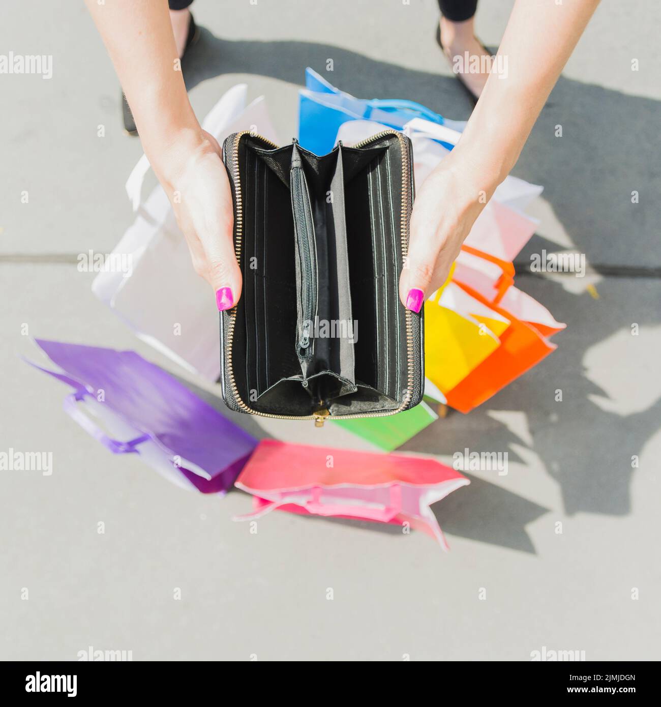 Hands holding empty wallet Stock Photo - Alamy