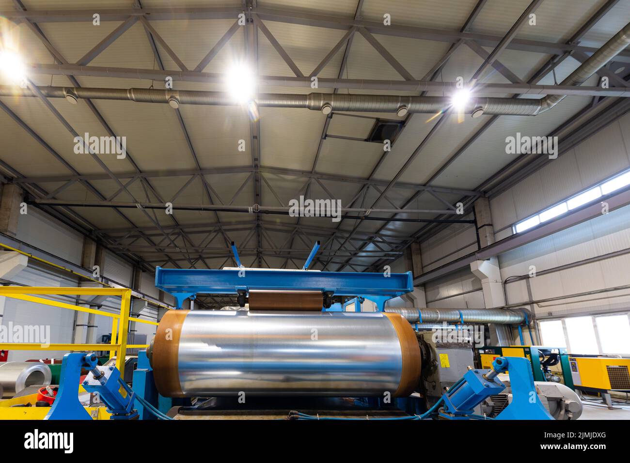 Production line of metal tile for roof. Steel forming machine in ...