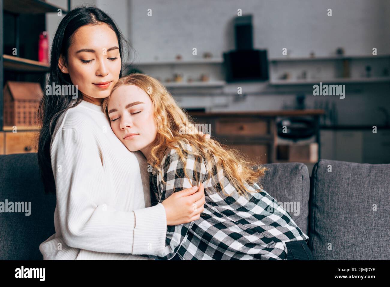 Friends comforting hi-res stock photography and images - Alamy