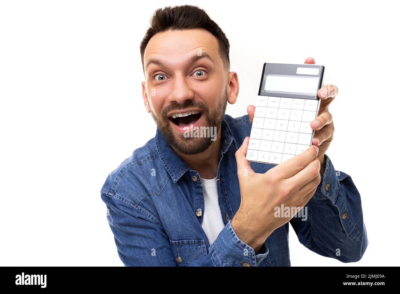 Charismatic bearded middle-aged man with a smile holding a calculator ...