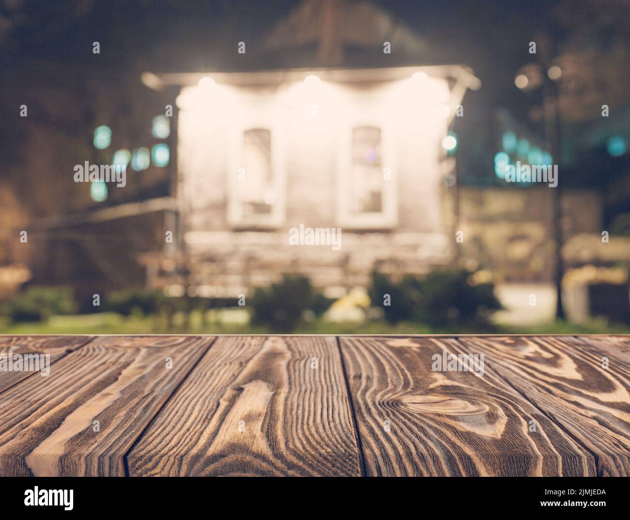 Empty wooden table front blurred house backdrop Stock Photo - Alamy