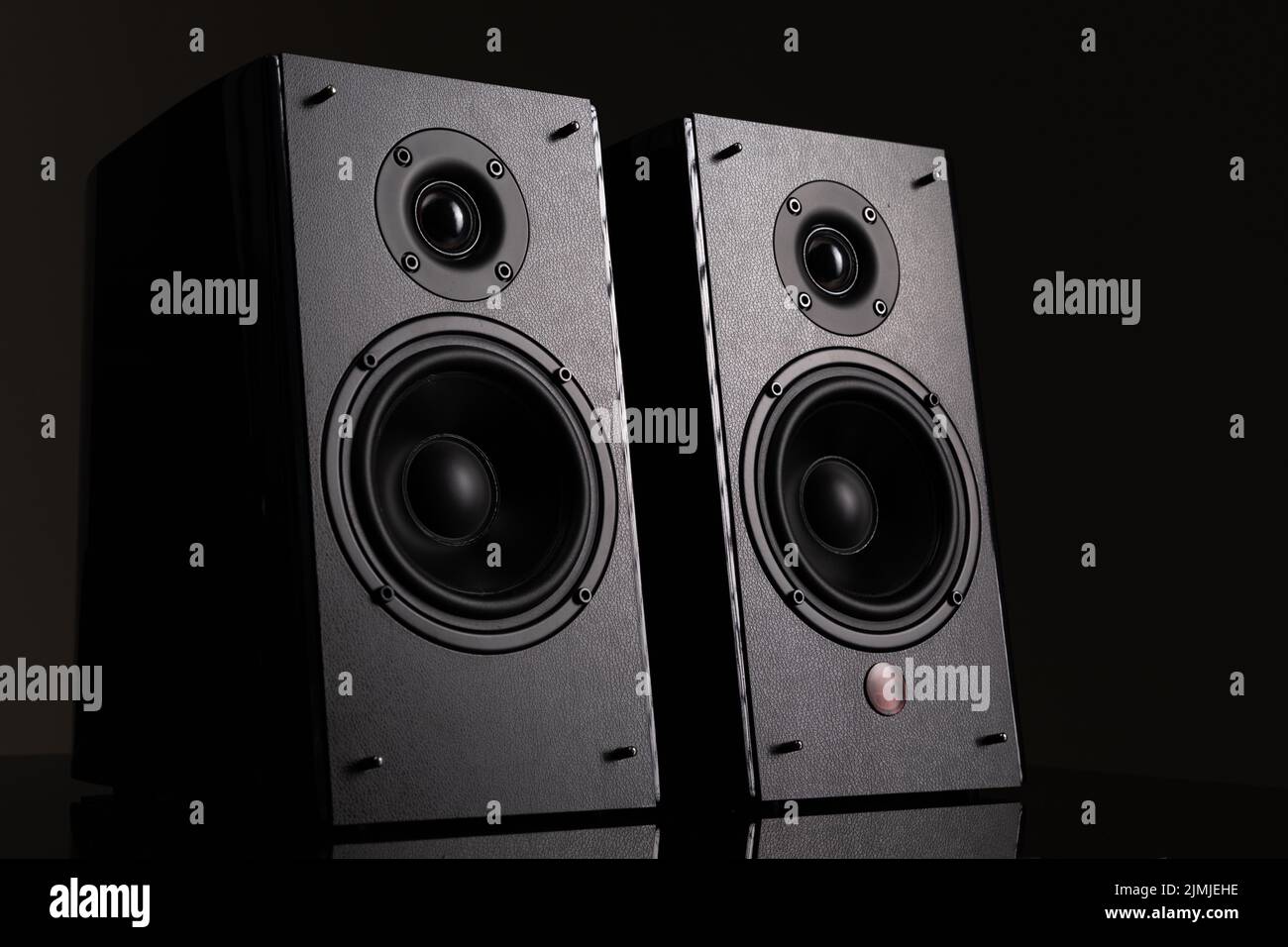 An image photograph of a pair of hi-fi level music speakers with two ...