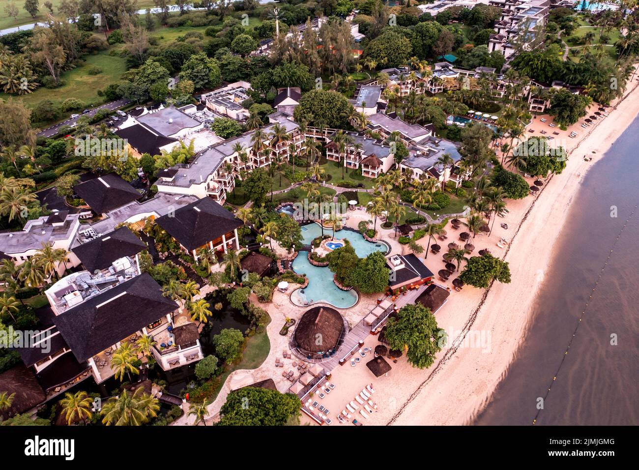 Aerial view: Africa, Mauritius, sunset on the coast of Flic en Flac, a ...