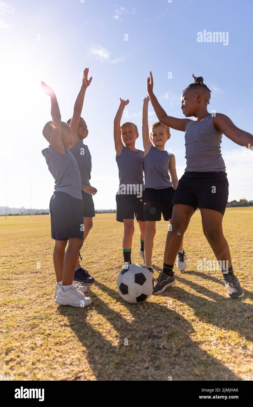 Football action arm raised hi-res stock photography and images - Alamy