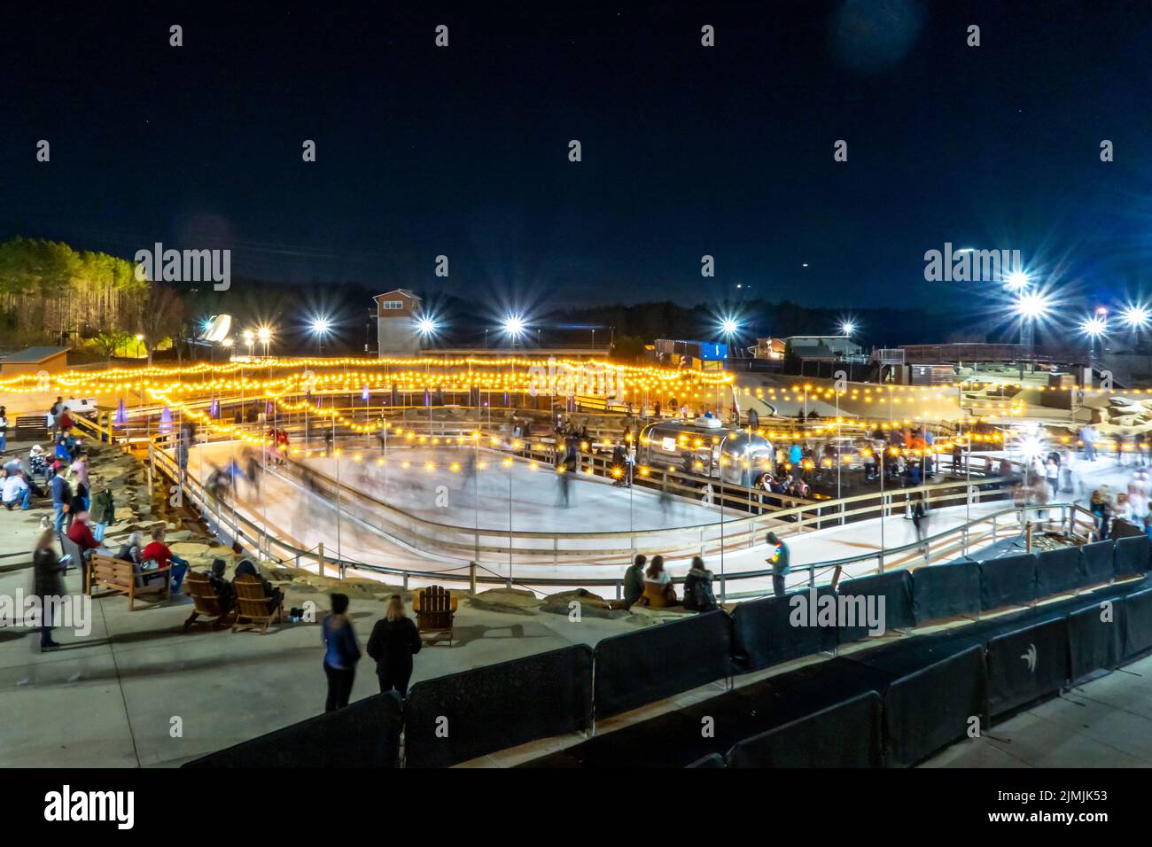 Beautiful outdoor ice rink at night with lights Stock Photo - Alamy