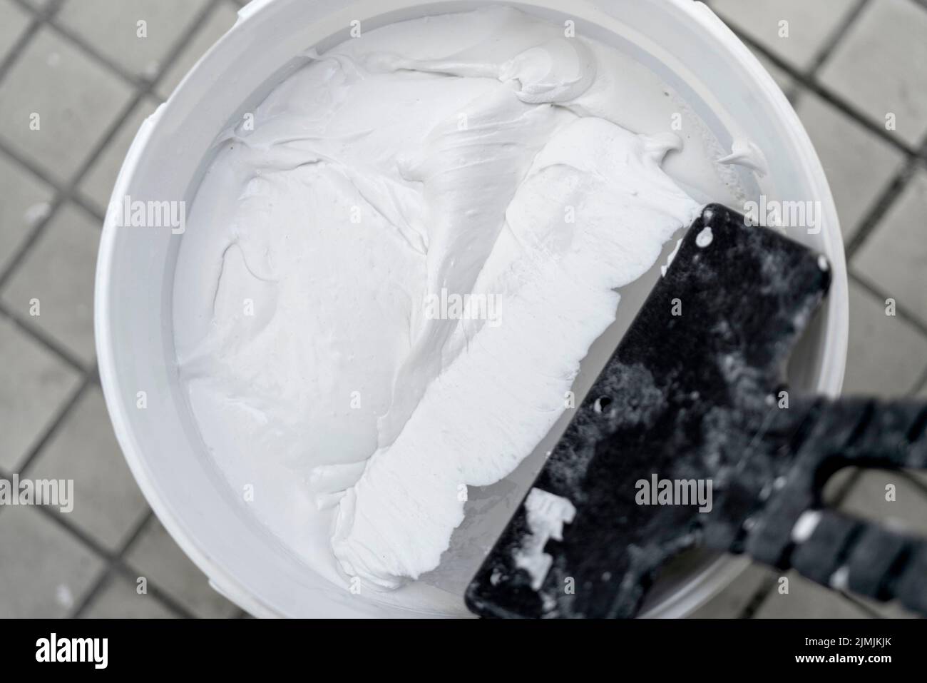 Texture of white plaster. Covering the concrete wall of the house ...