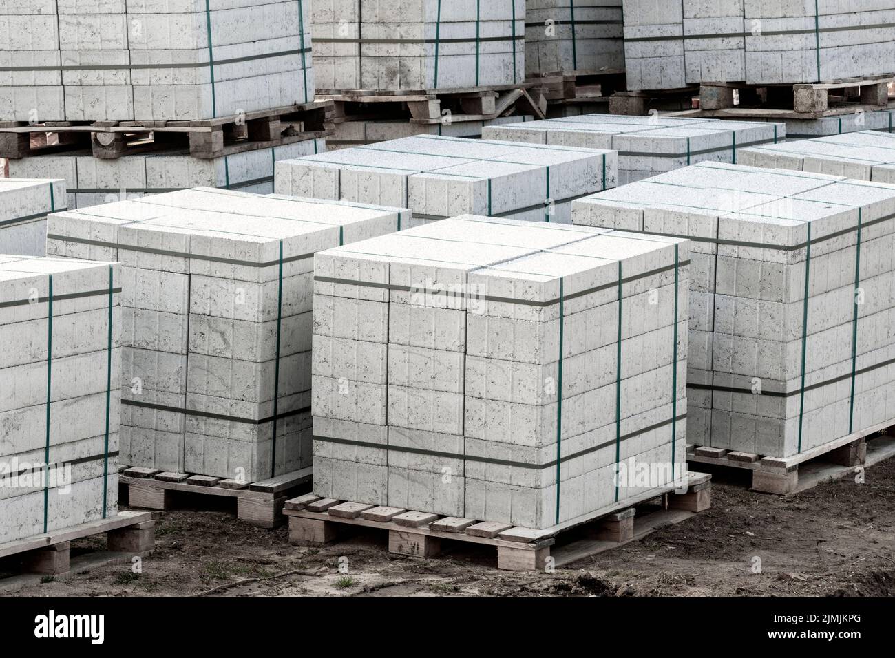 Concrete pavement tiles stacked on the wooden pallets Stock Photo - Alamy