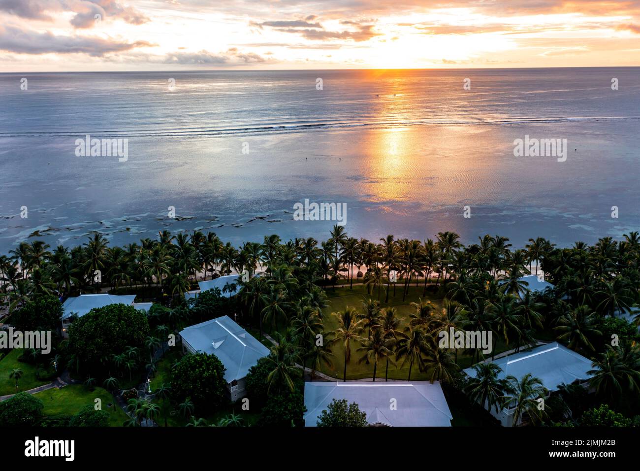 Aerial View: Africa, Mauritius, Sunset on the coast of Flic en Flac ...