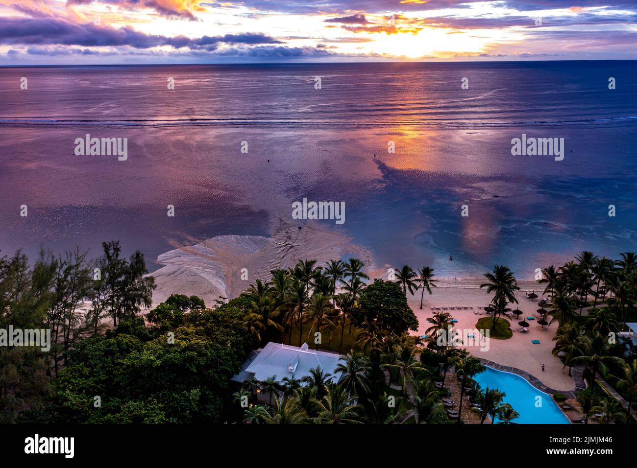 Aerial view: Africa, Mauritius, sunset on the coast of Flic en Flac, a ...