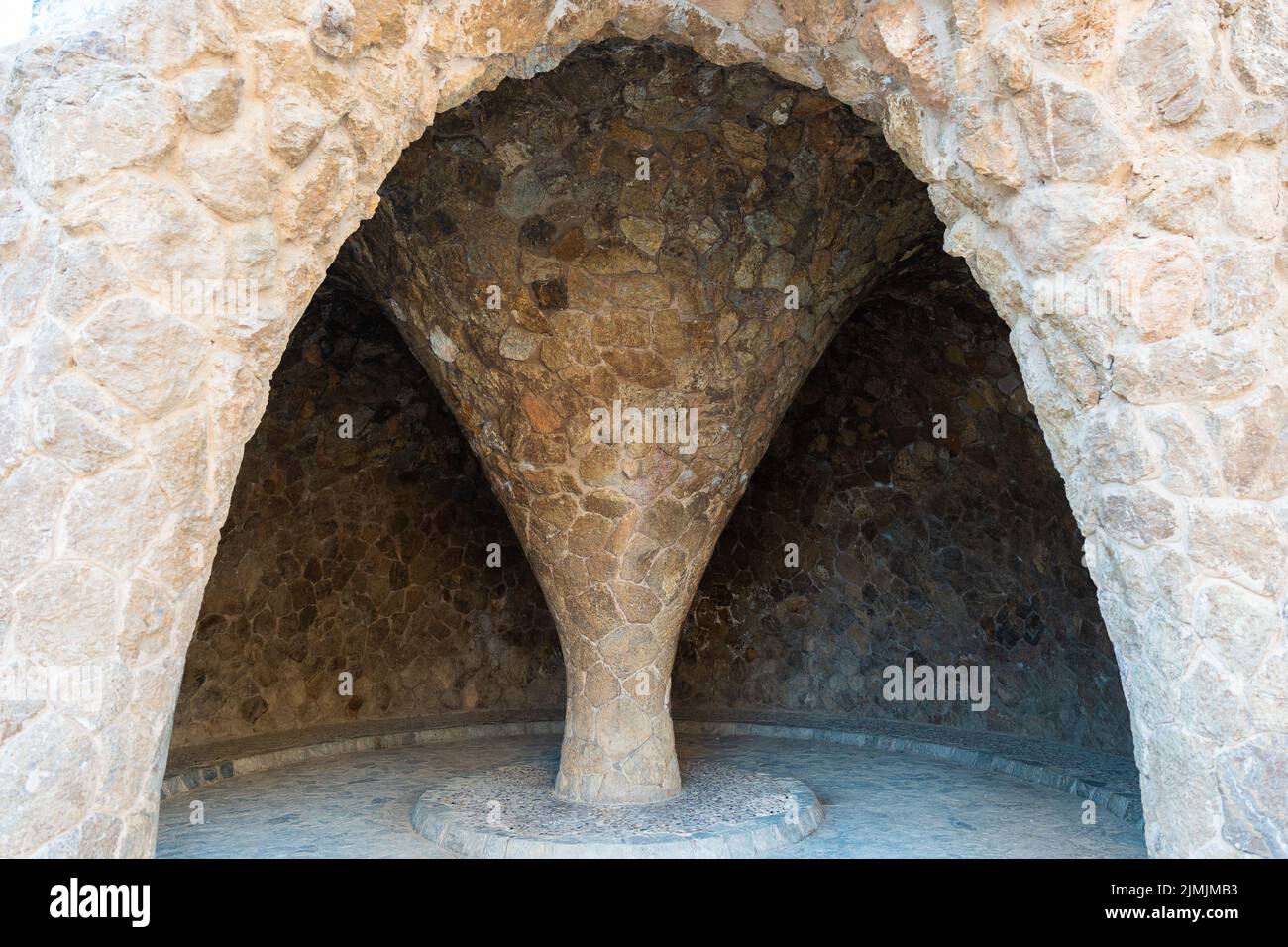 Stone made round column Park Guell in Barcelona, Spain Stock Photo - Alamy
