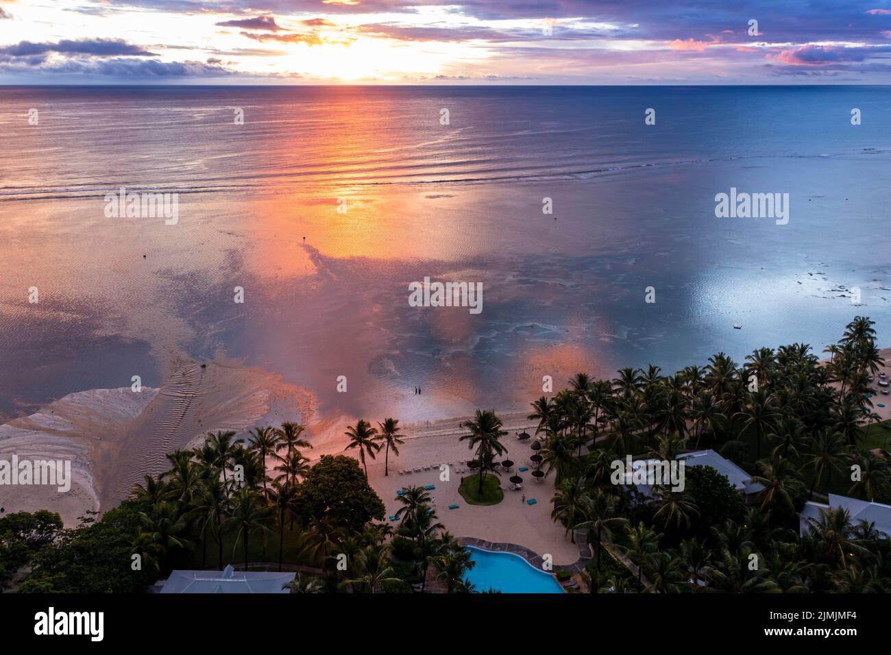 Aerial view: Africa, Mauritius, sunset on the coast of Flic en Flac, a ...
