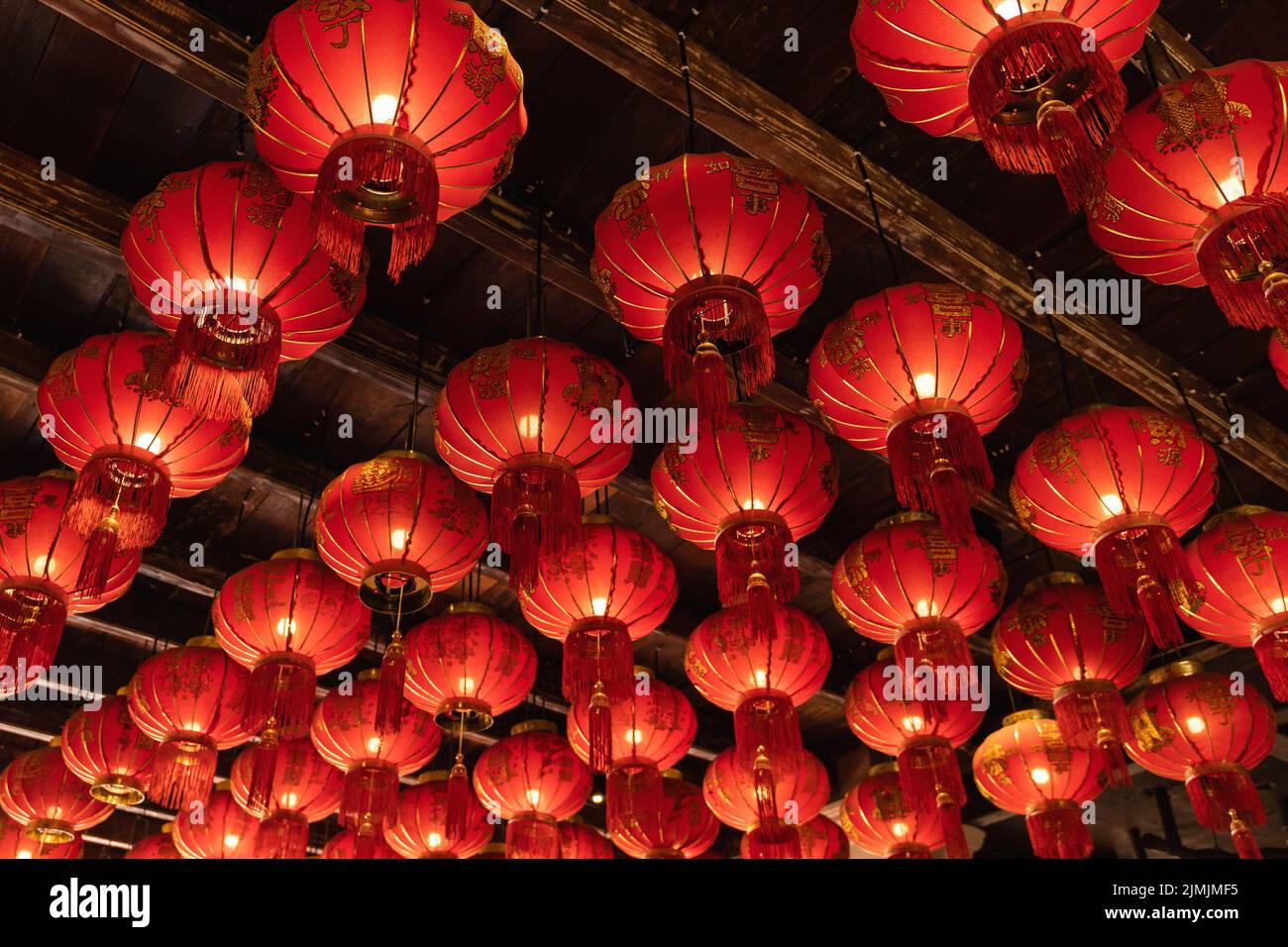 Many chinese paper lanterns on the ceiling Stock Photo - Alamy