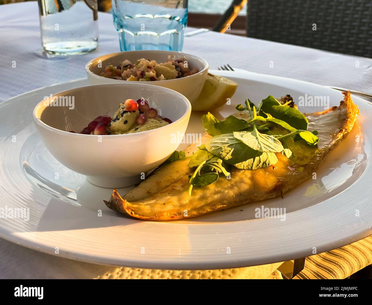 Grilled turbot fillet with side dishes, Port Andratx, Mallorca, Spain ...
