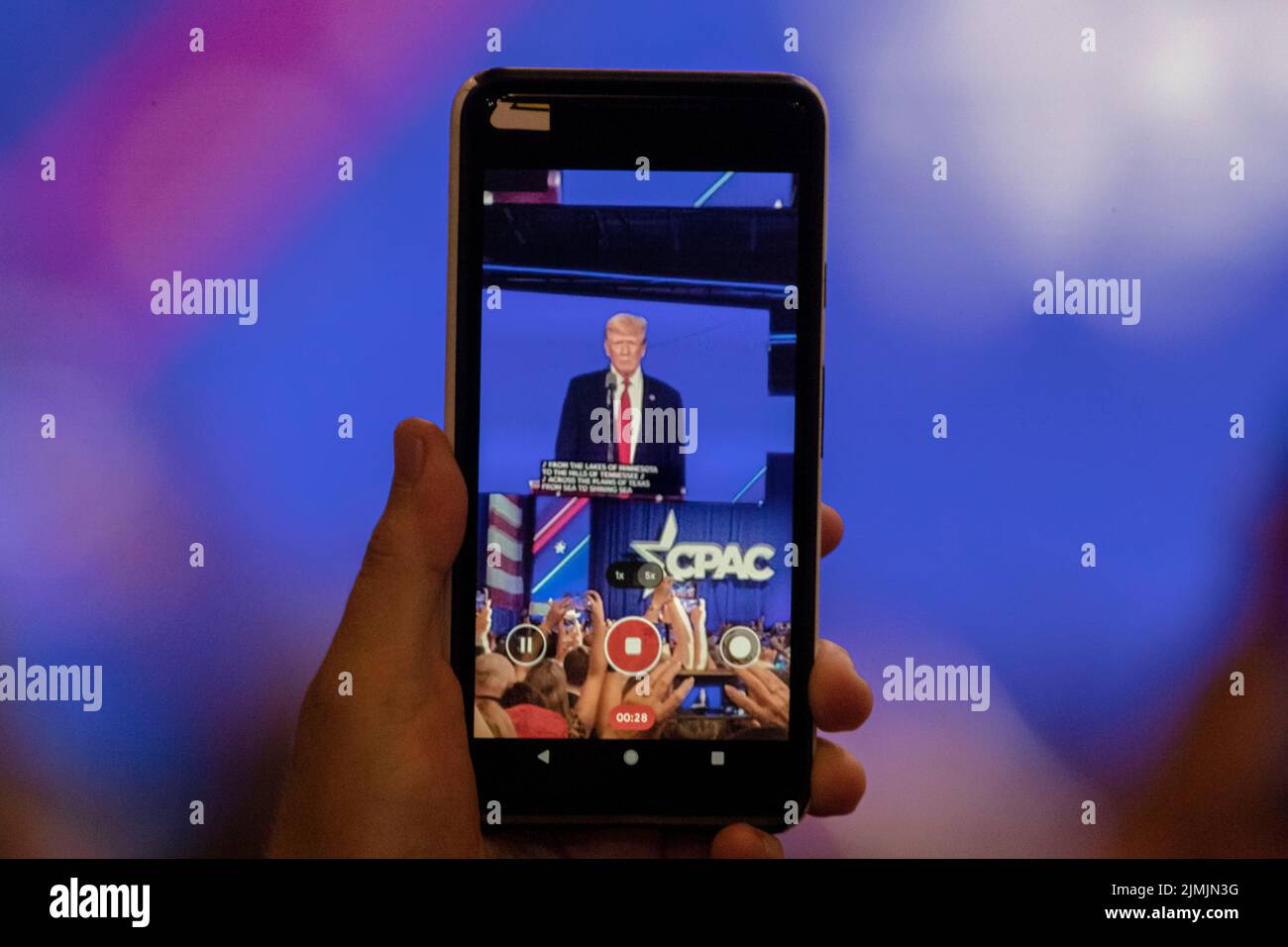 Dallas, Texas, USA. 6th Aug, 2022. Cellphones rise as Donald Trump ...