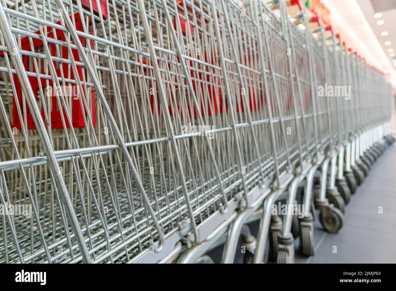 Trolley for transportation of products in a supermarket Stock Photo - Alamy