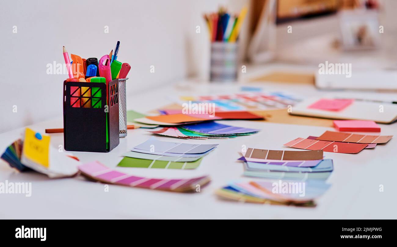 Lots of colour to spark lots of creativity. a notebook and various ...