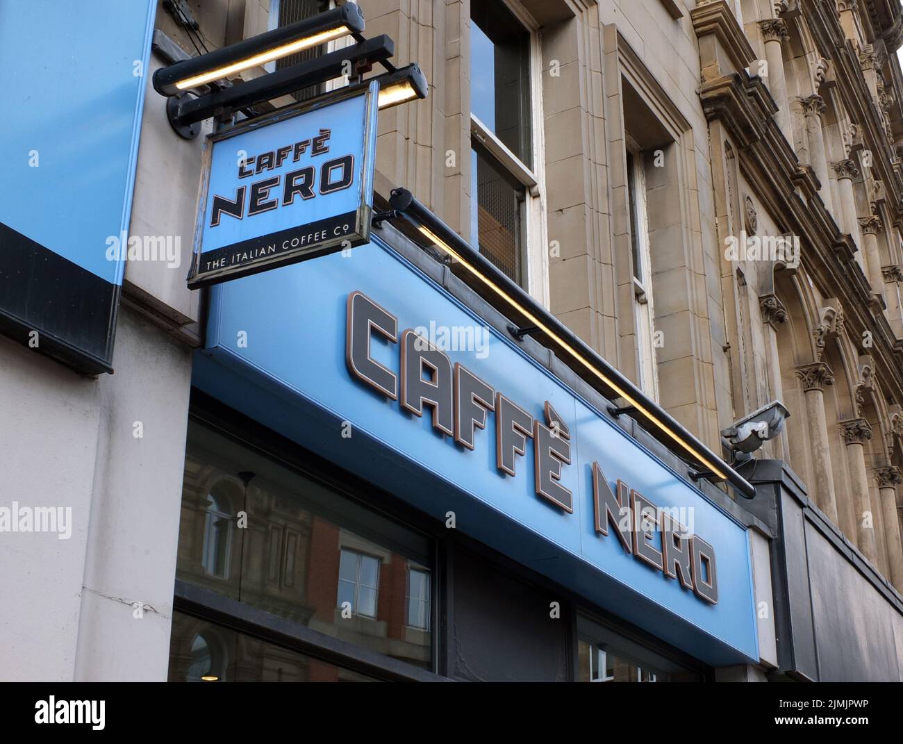 Signs above the front entrance of a cafe nero coffee take away and cafe ...