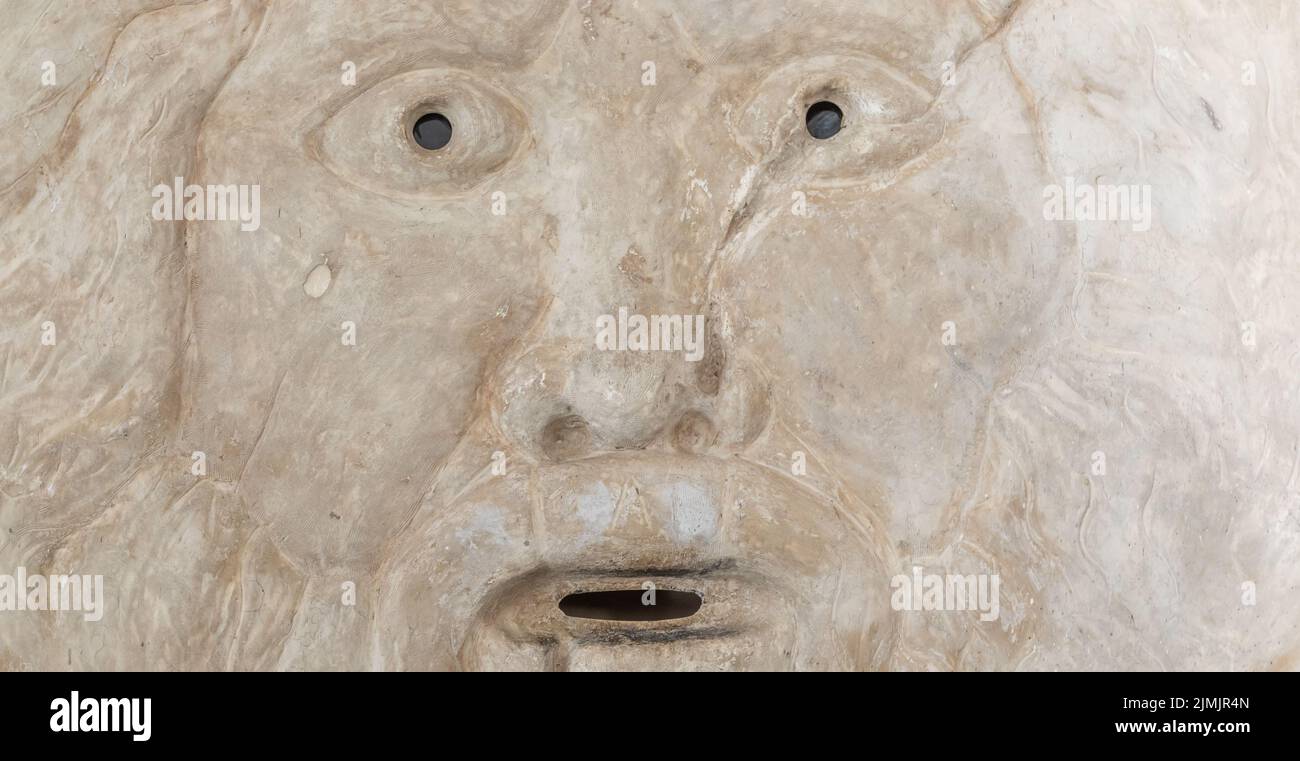 Mouth of truth sightseeing in Rome, Italy. Historical sculpture made of ...