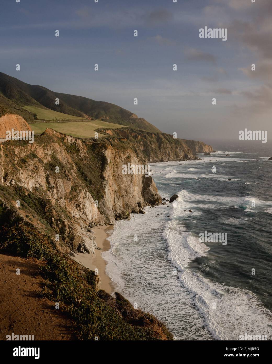 A scenery of a cliffy shore Stock Photo - Alamy