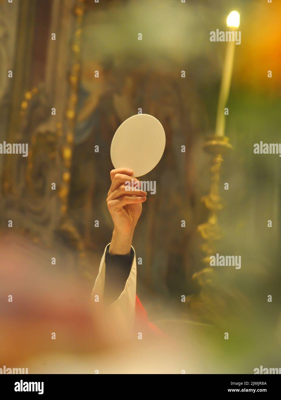 Communion wafer hi-res stock photography and images - Alamy