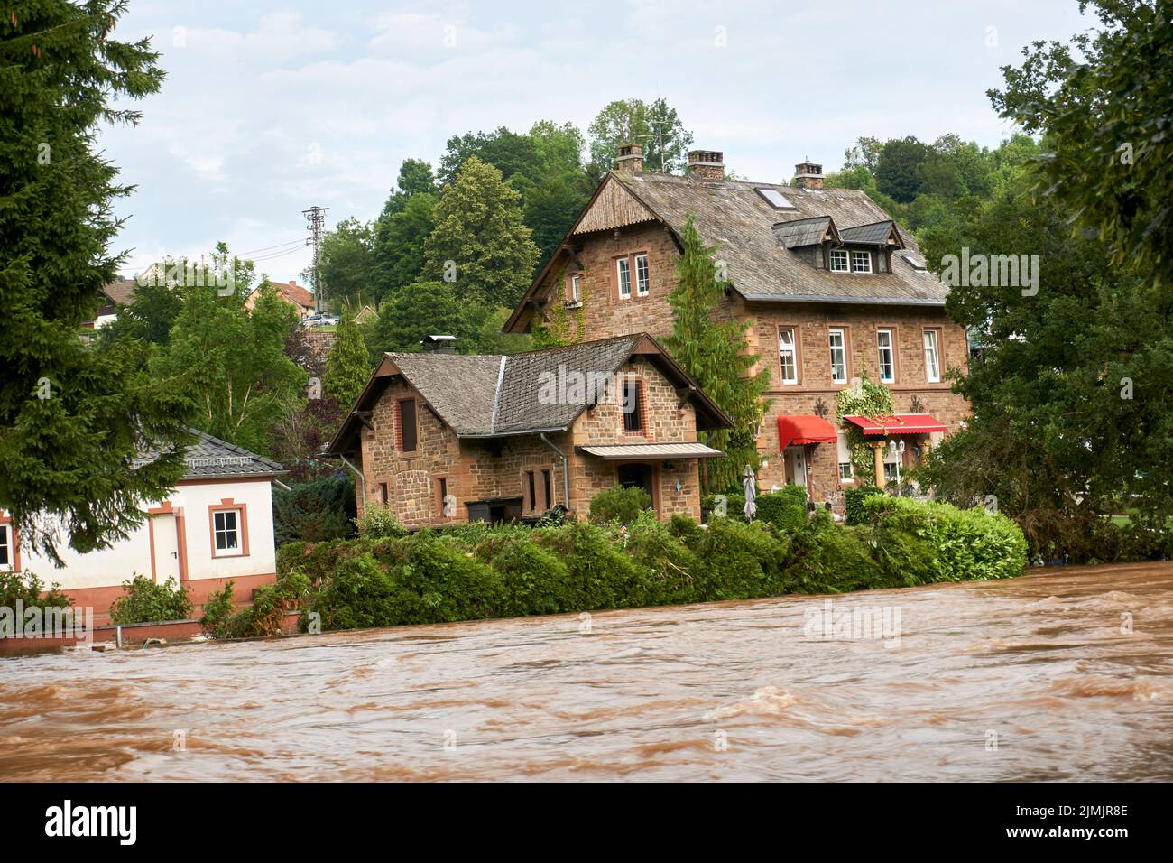Summer flood of the Kyll in Muerlenbach in the Eifel in July 2021 Stock ...