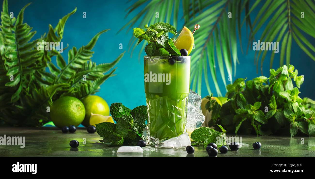 Green alcoholic cocktail with gin, tequila, liquor, juice, lime ...