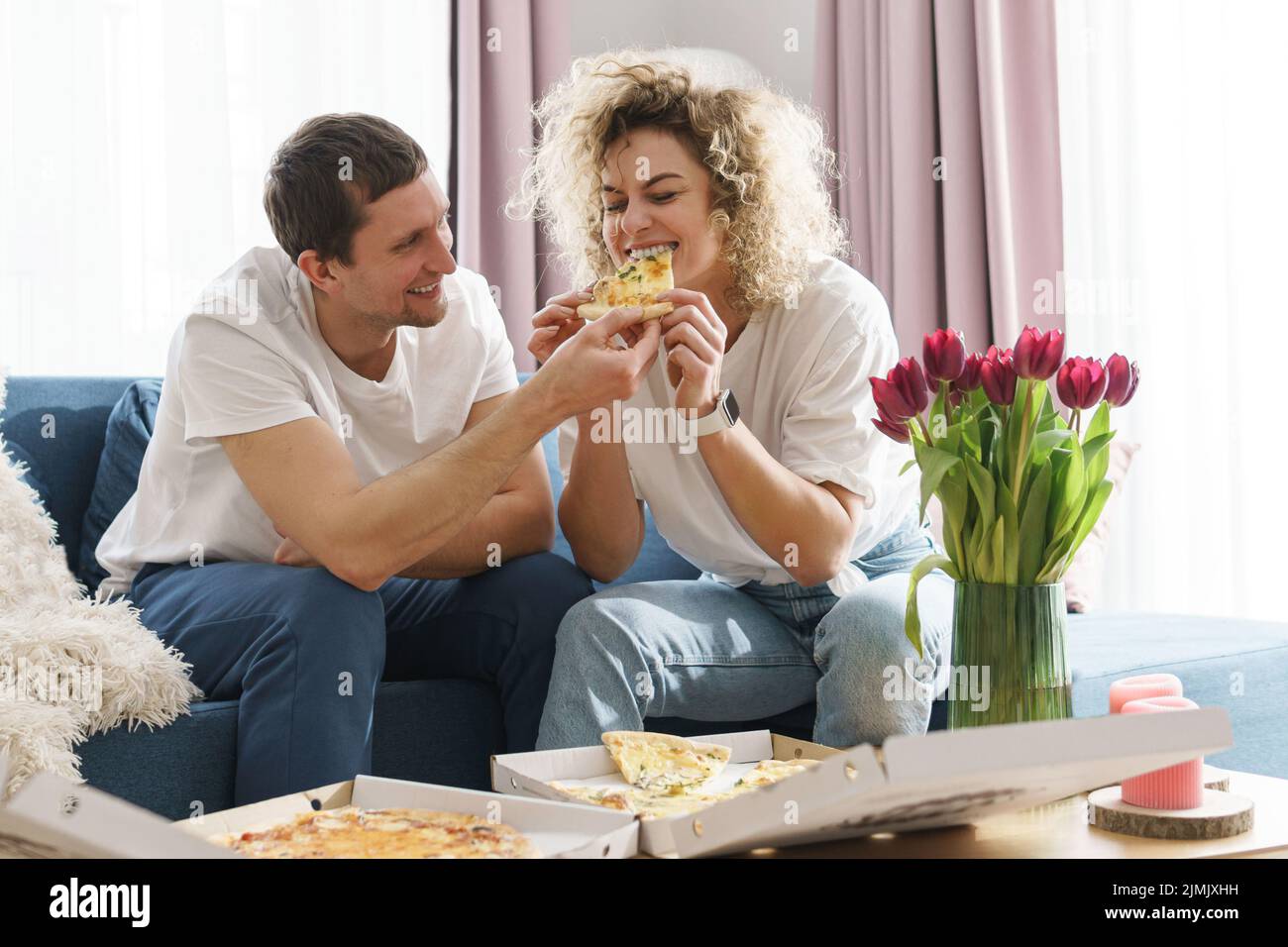 Man eating pizza happy hi-res stock photography and images - Alamy