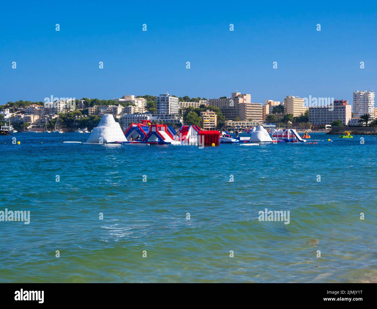 Bouncy castles in the water Stock Photo - Alamy