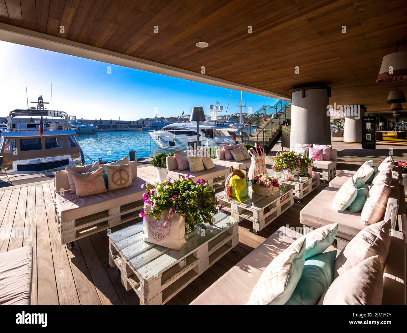 Superyachts in marina Port Adriano Stock Photo - Alamy