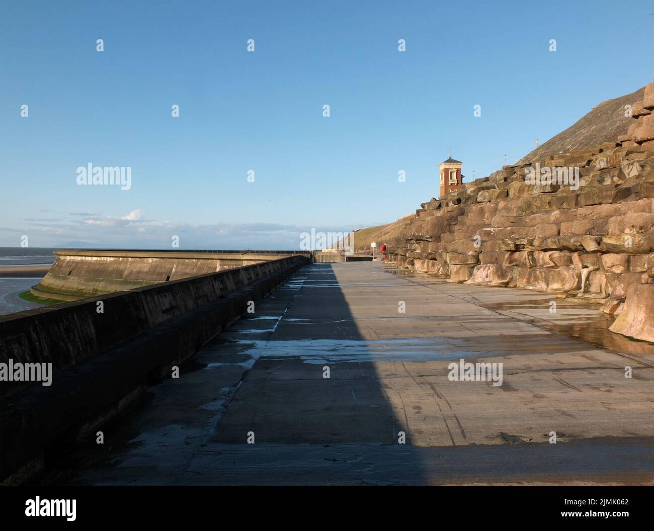 Concrete stairs on seawall in the cliffs area blackpool with the beach ...