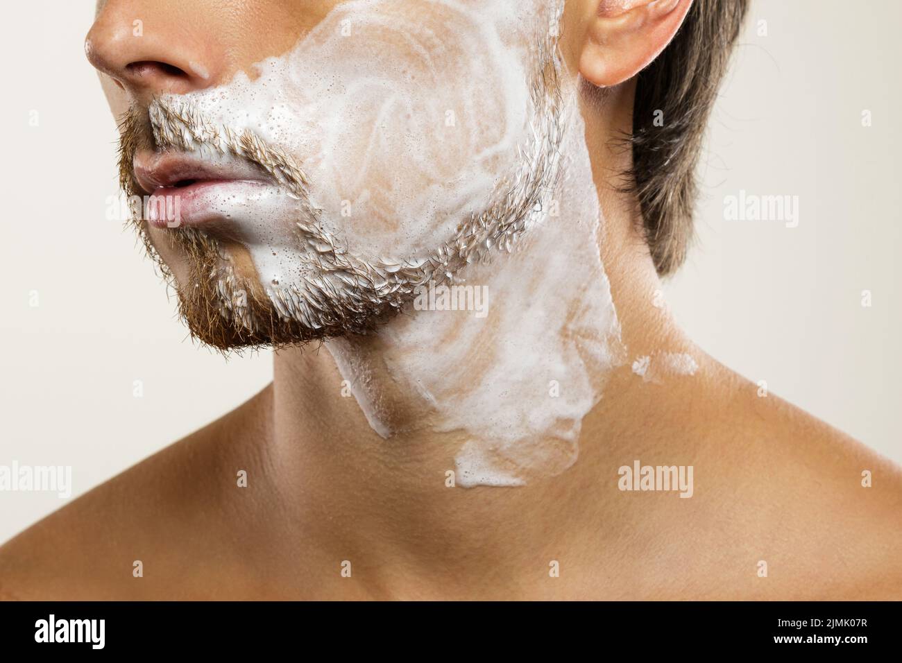 Man with a shaving cream on his face Stock Photo - Alamy