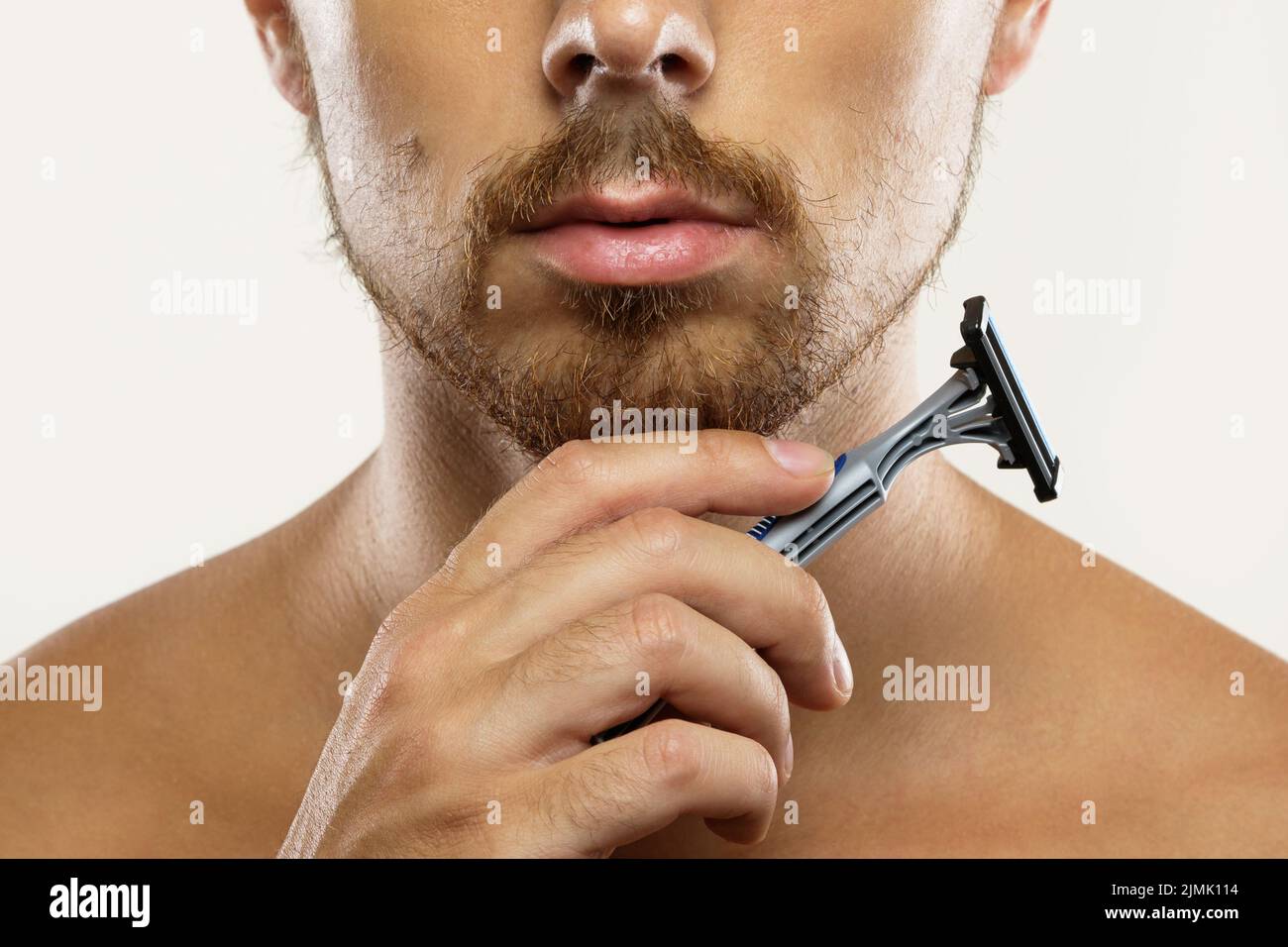 Man with unkempt beard before a shaving routine Stock Photo - Alamy