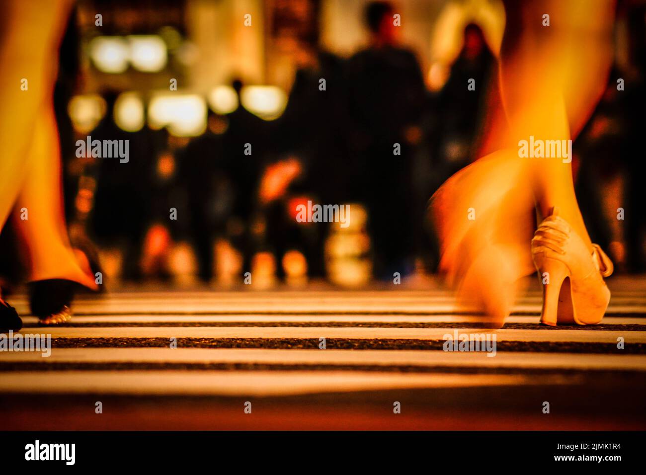 Feet of those who walk the Shibuya scramble intersection Stock Photo ...