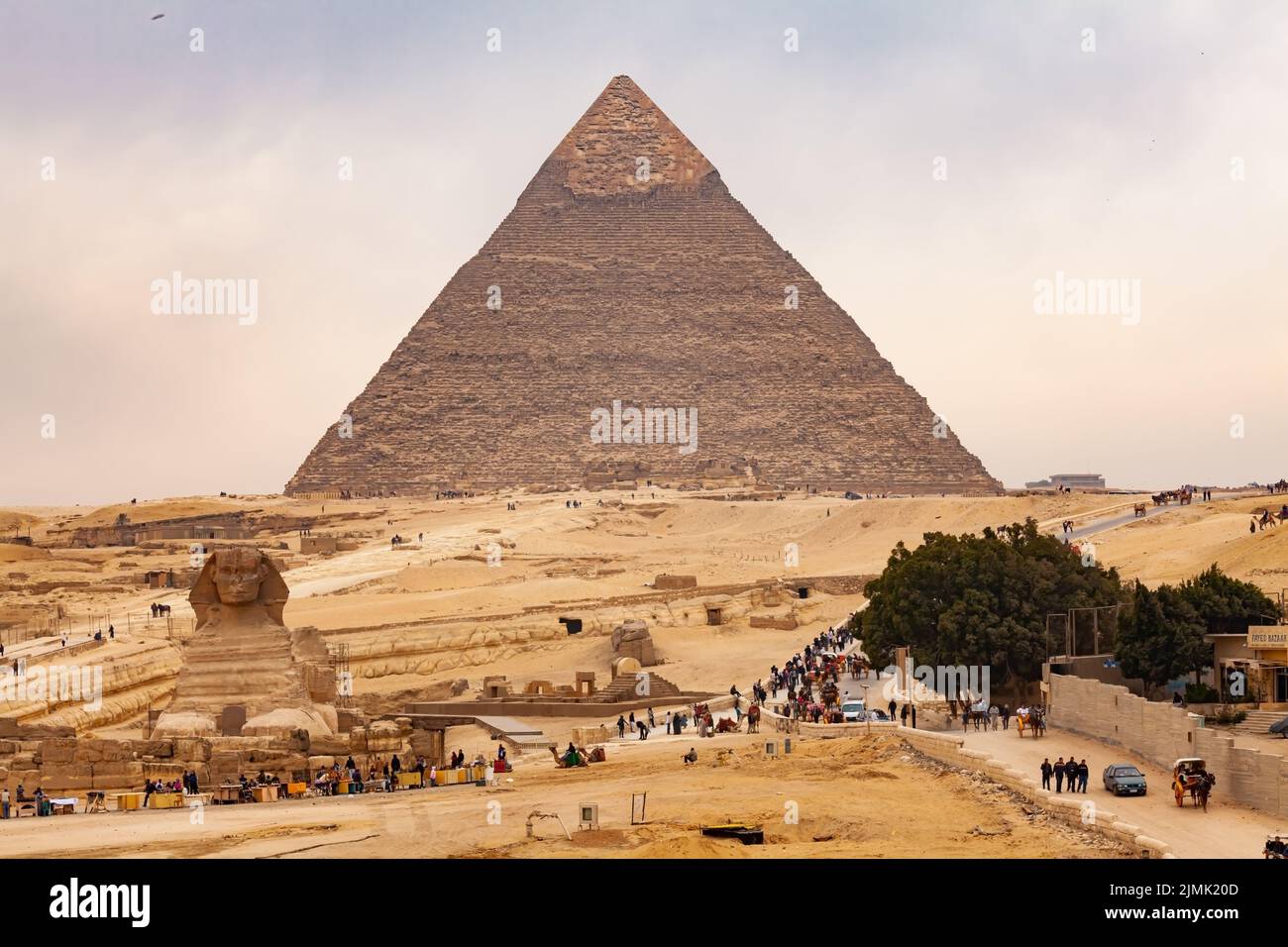 Tourists and native people came out of The Giza Plateau before the ...