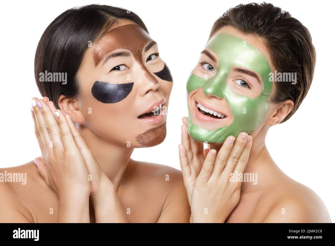 Two beautiful girls with colorful peel-off masks on their faces Stock ...