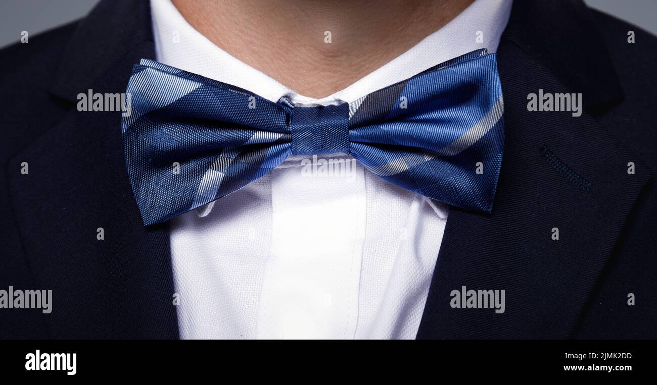 Navy blue bow tie hi-res stock photography and images - Alamy