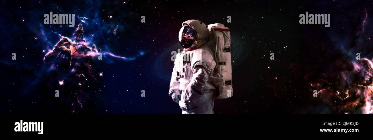 Astronaut in space in the solar system Earth. Blue light on background ...