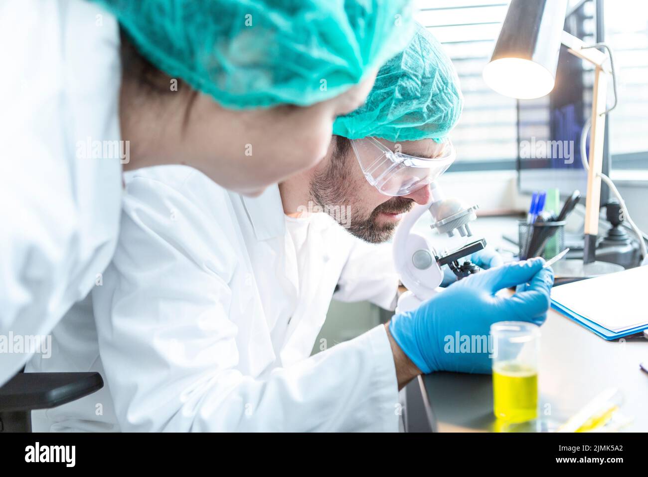Scientists in a lab Stock Photo - Alamy